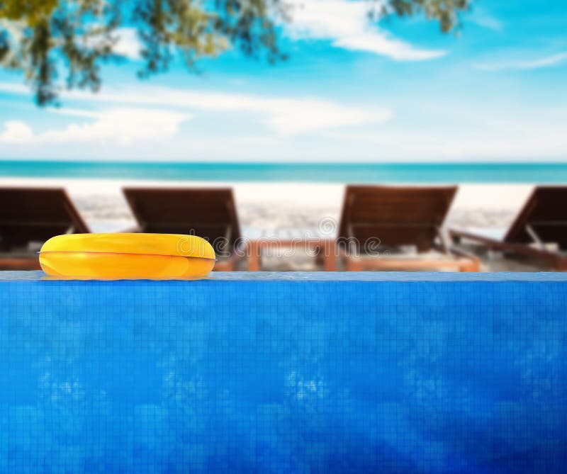 Pool Side View with Yellow Swim Ring Stock Image - Image of pool, float ...