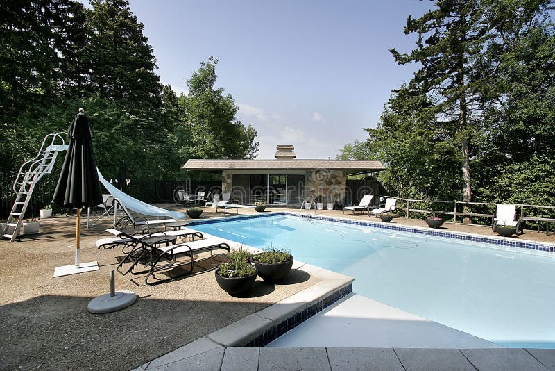 Pool slide and pool house stock photo. Image of single - 8904034