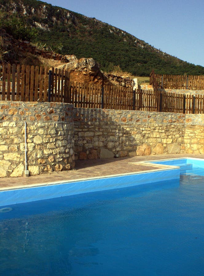 Pool and stone wall stock photo. Image of stone, rustic - 5733782