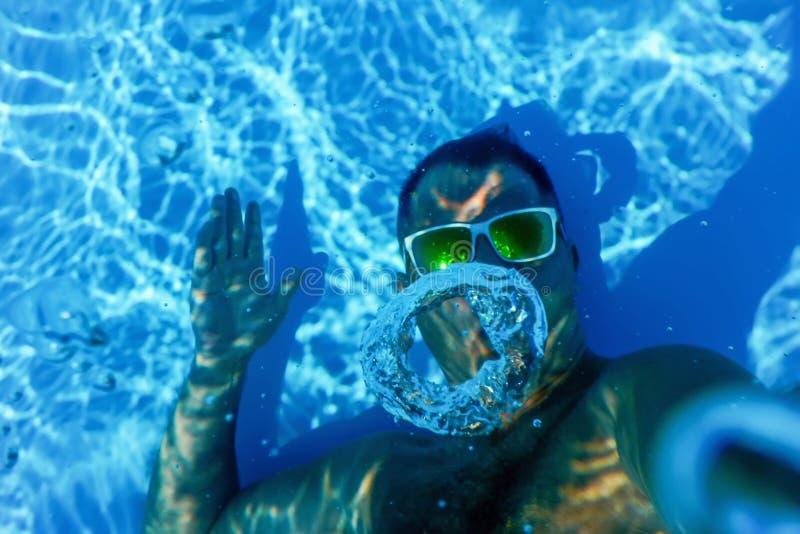 Pool Summer Party,Â Man Making Bubble Rings Underwater in Swimming Pool ...