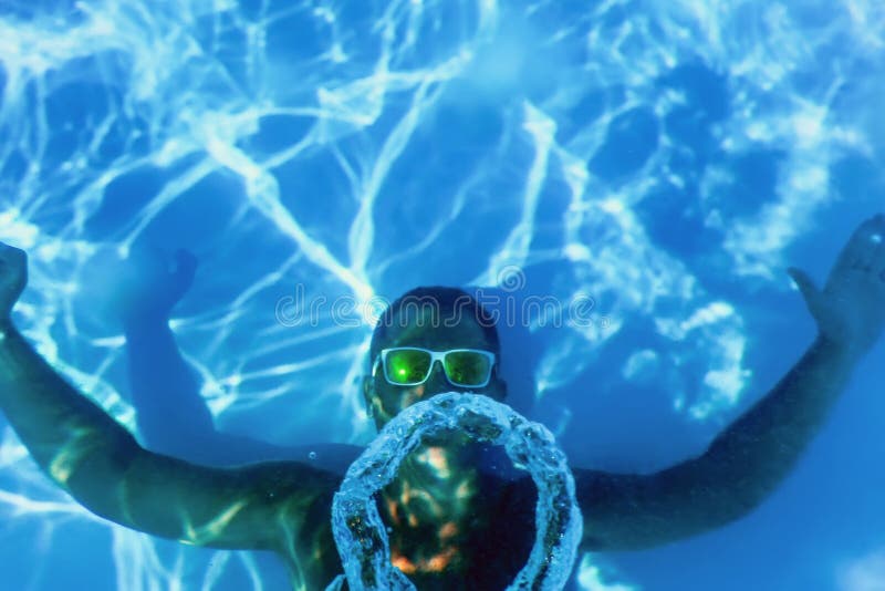 Pool Summer Party,Â Man Making Bubble Rings Underwater in Swimming Pool ...