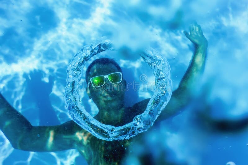 Pool Summer Party,Â Man Making Bubble Rings Underwater in Swimming Pool ...
