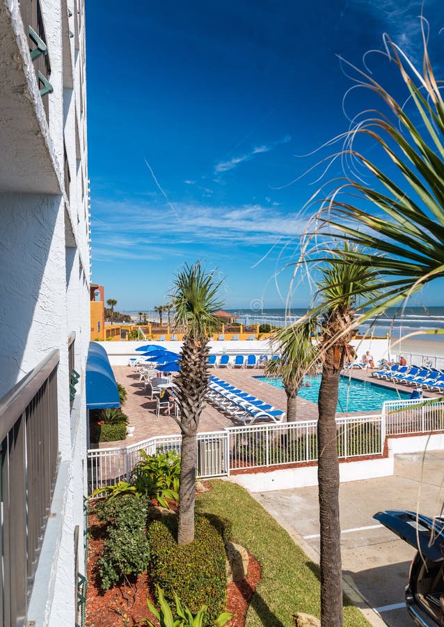 Pool and Sun Chairs Along the Ocean. Holiday Concept Stock Photo ...