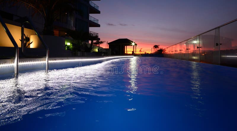 A pool at sunset stock photo. Image of swim, waters, pool - 49231952