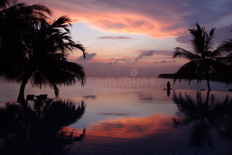 Pool sunset stock photo. Image of maldiverna, indian - 65762076