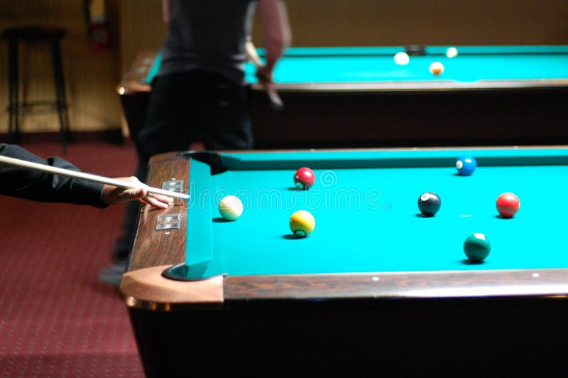 Pool Table with Cue Lined Up Stock Image - Image of play, ball: 340674499