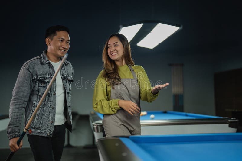 Female Pool Player Guided by the Male Pool Player Stock Photo - Image ...