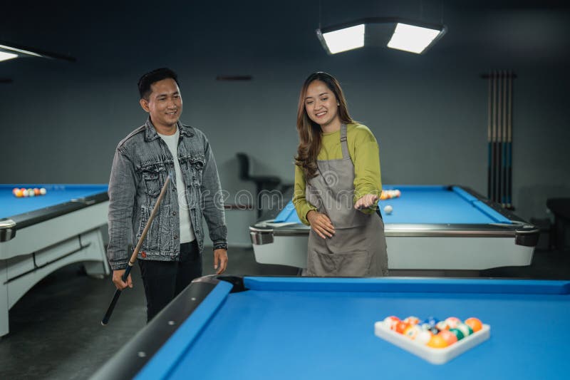 Female Pool Player Guided by the Male Pool Player Stock Photo - Image ...