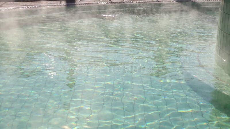 Hot Thermal Water Gushes from the Spring and Flows Down the Pool ...