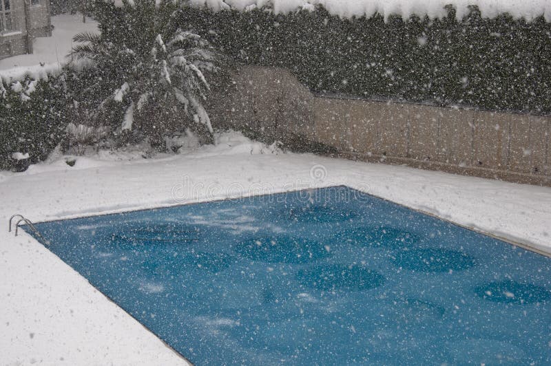 Swimming pool under snow stock photo. Image of snowstorm - 23137384