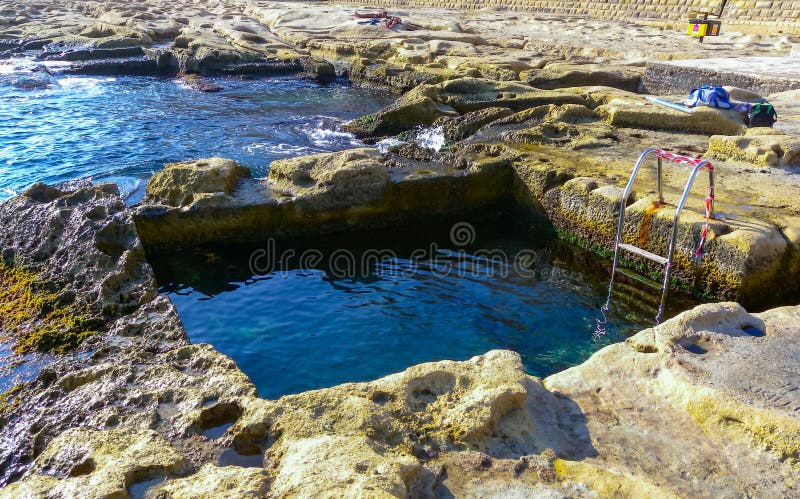 Pools Carved into the Stone Shore on the Island of Gozo, Malta Stock ...