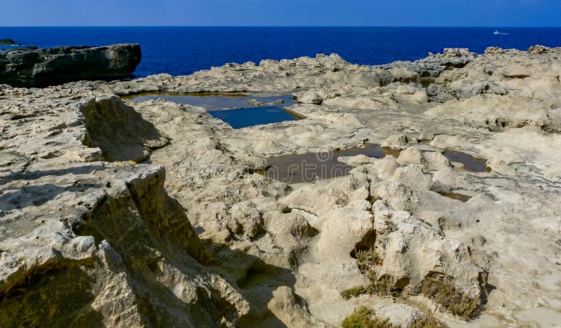 Pools Carved into the Stone Shore on the Island of Gozo, Malta Stock ...