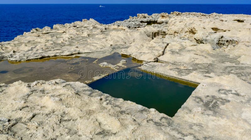 Pools Carved into the Stone Shore on the Island of Gozo, Malta Stock ...