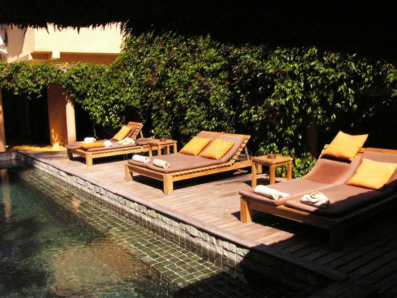 Poolside 2 stock photo. Image of sunshine, pool, poolside - 73584