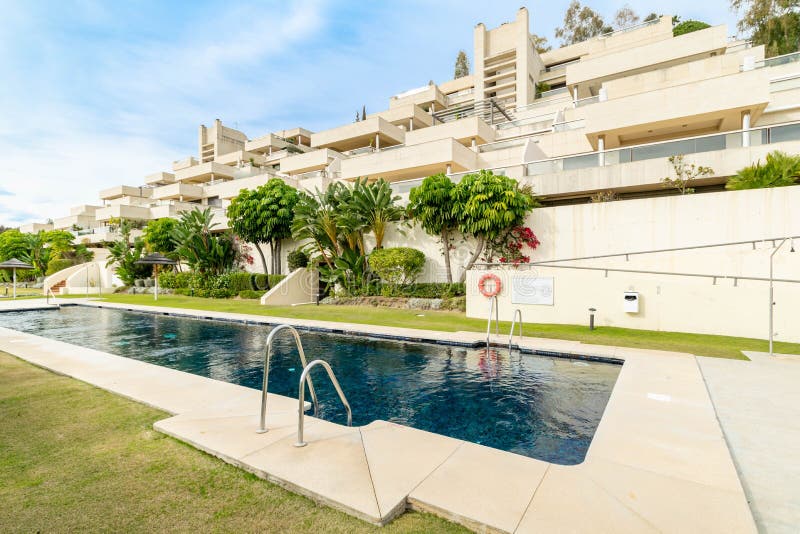 Poolside in a Costa Del Sol Apartment Complex Stock Image - Image of ...