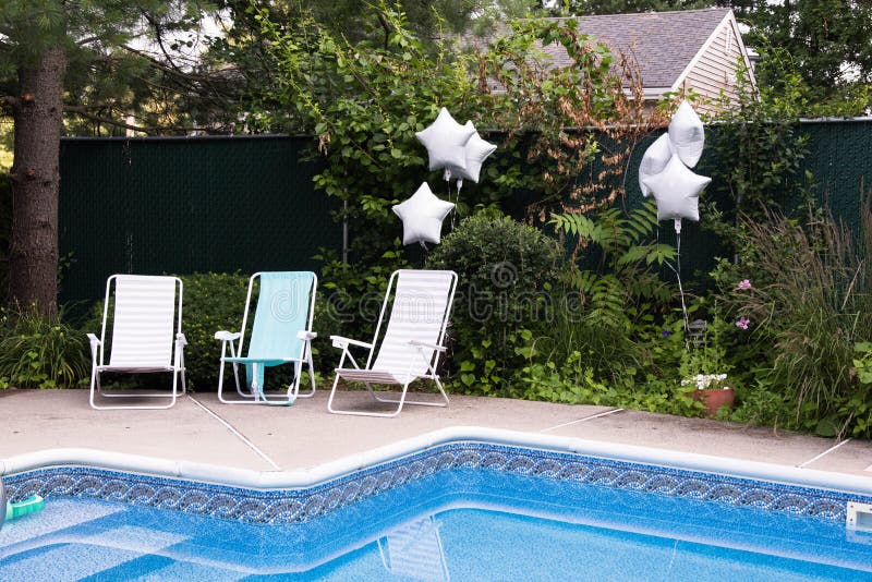 Poolside loungers stock photo. Image of baloons, landscape - 57199588