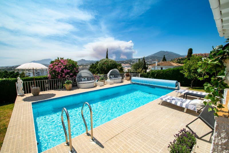 Poolside with Mediterranean Mountain Views Stock Photo - Image of ...