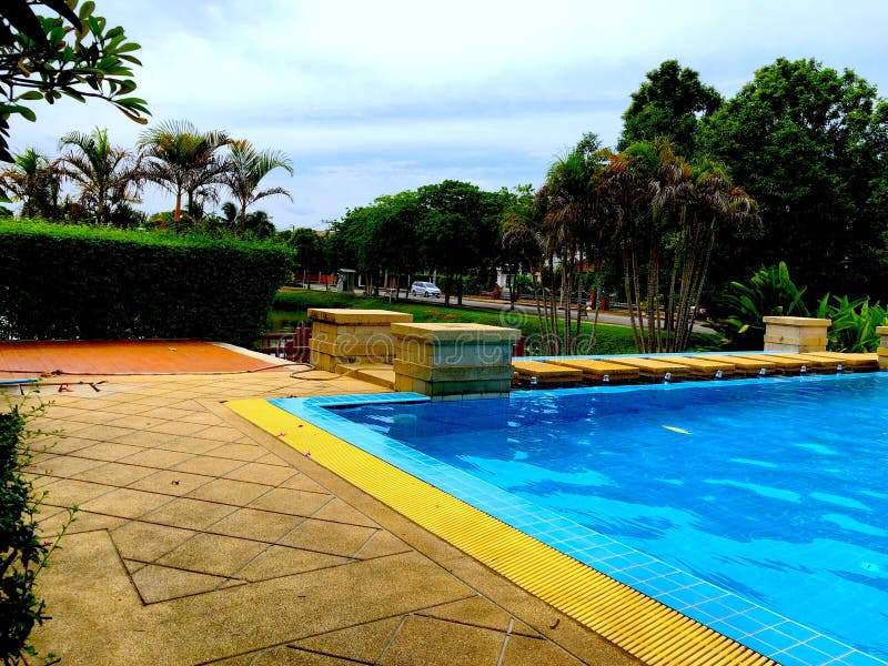 Poolside stock photo. Image of bluewater, poolside, swimming - 122328754