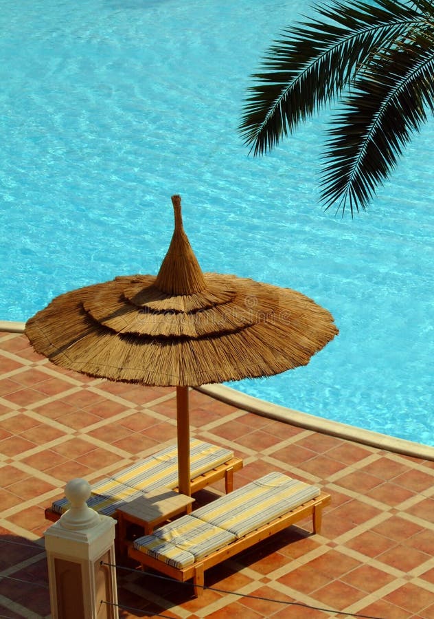 Poolside relaxation stock photo. Image of poolside, beauty - 7216970