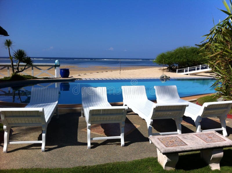 Poolside seats stock image. Image of summer, pool, beach - 53401579