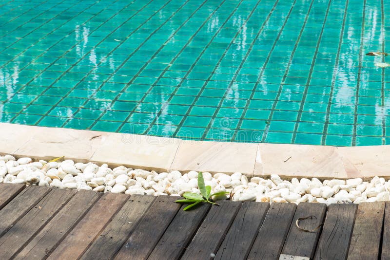 Stone on the Edge of the Swimming Pool Stock Image - Image of tiles ...