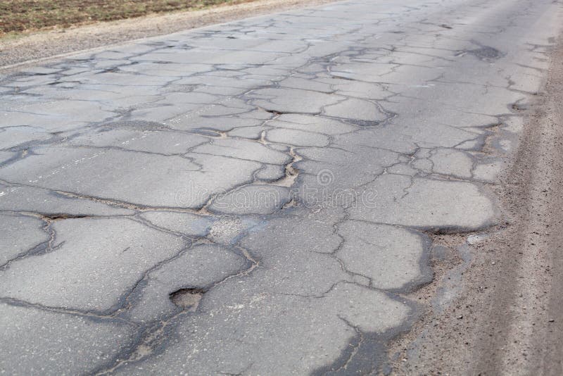 Poor Asphalt Condition Road. Stock Image - Image of water, walk: 91936679