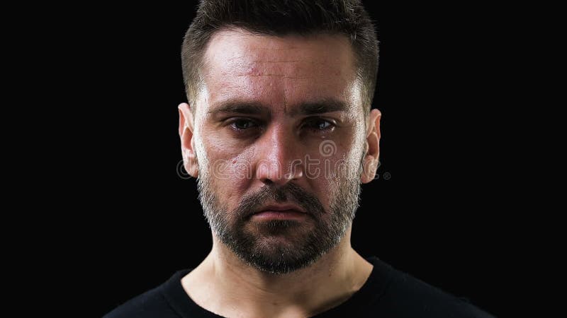 Poor Crying Man Looking at Camera Isolated on Black Background, Life ...