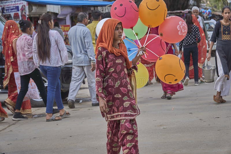 A Poor Girl is Selling Balloons Editorial Stock Photo - Image of girl ...