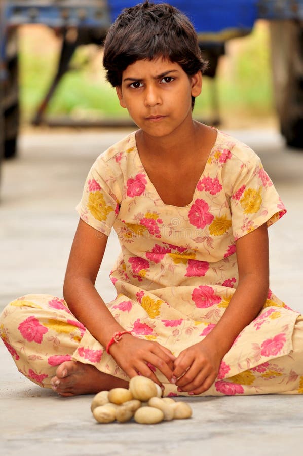 Poor girl with stones stock image. Image of poor, village - 11193683