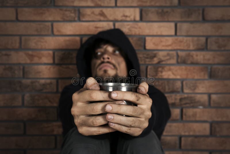 Poor homeless man begging stock photo. Image of money - 130682256