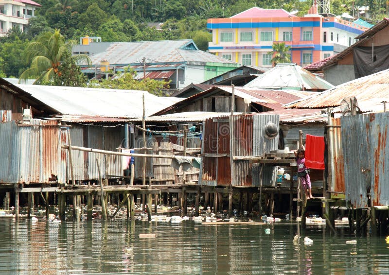 Poor houses by the sea editorial image. Image of indonesia - 27617130