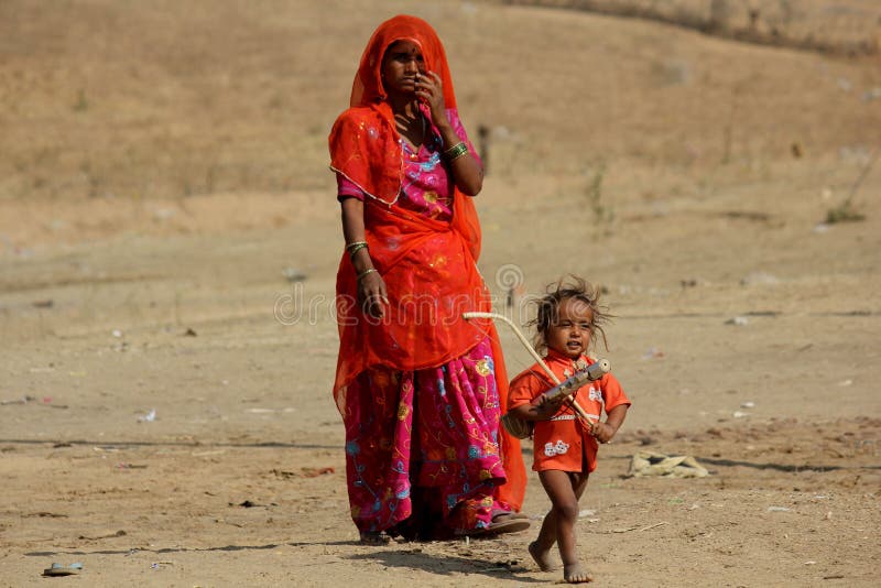 A Poor Indian Mother with Her Son Editorial Photography - Image of ...