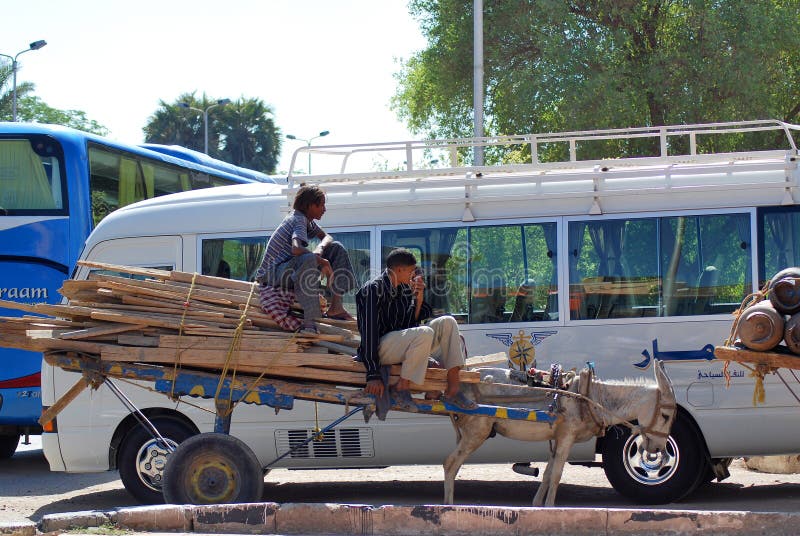 Poor Man Caring Merchandise in Buggy Pull by a Donkey Editorial Image ...