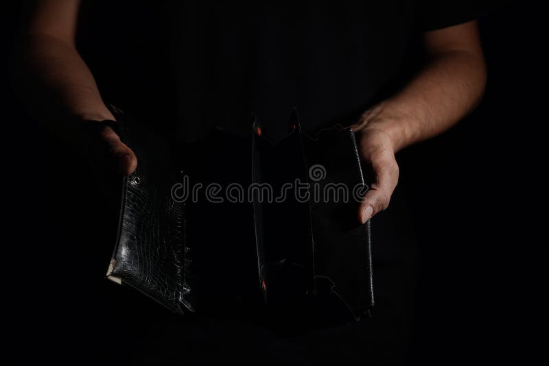 Poor man with empty wallet stock photo. Image of beggar - 125943266