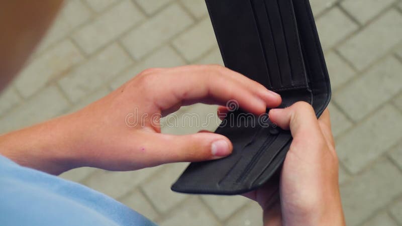 The Poor Man Looks at the Empty Wallet Stock Video - Video of finance ...