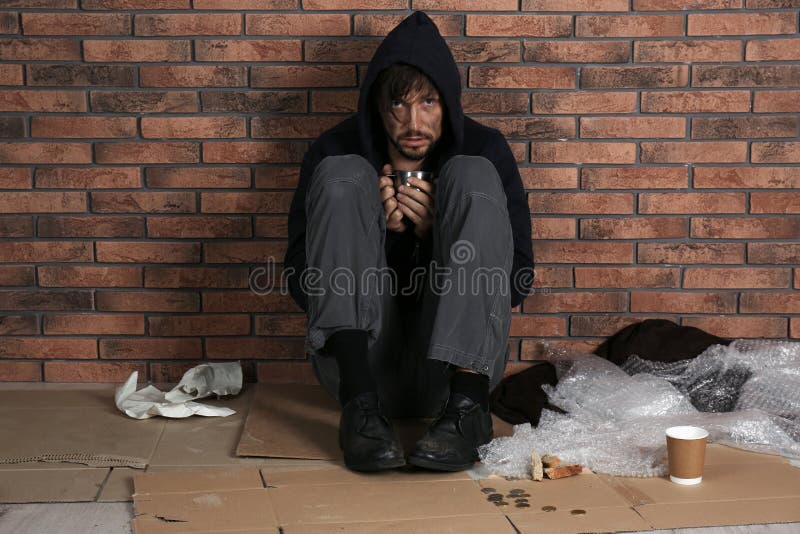 Poor Man Sitting with Mug on Floor Stock Photo - Image of needy, food ...