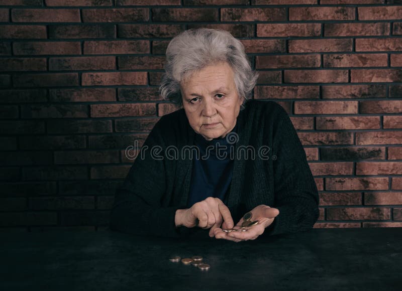 Poor Mature Woman Counting Coins Stock Photo - Image of cold, charity ...