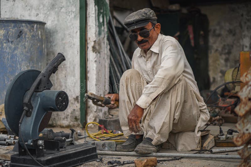 Poor Old Aged Pakistani Welder Working in His Workshop Stock Photo ...