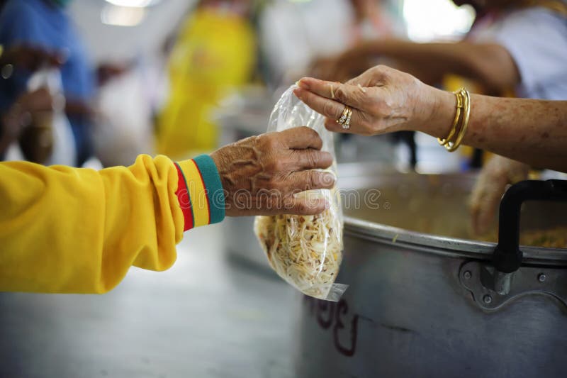 Poor People Bring Containers To Contain Food from the Sharing of the ...