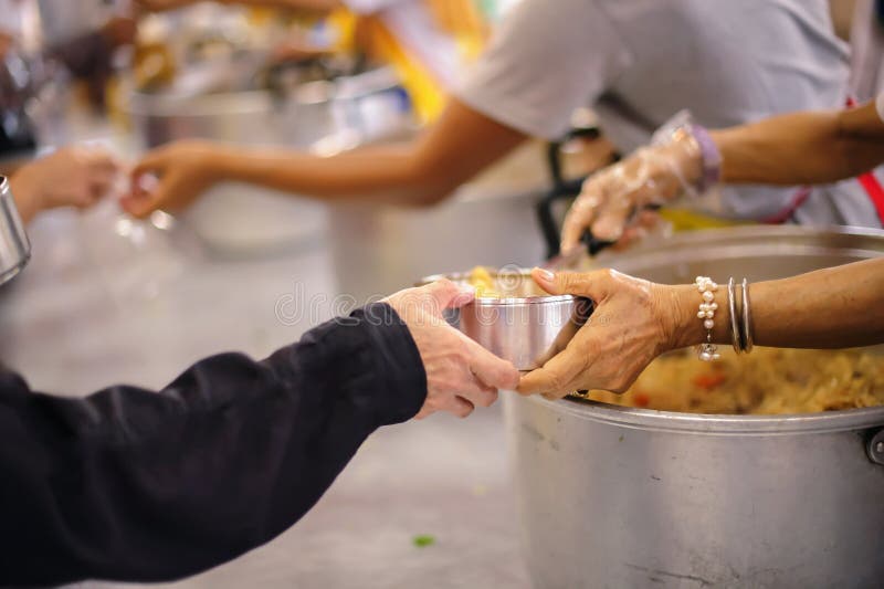 Poor People Bring Containers To Contain Food from the Sharing of the ...