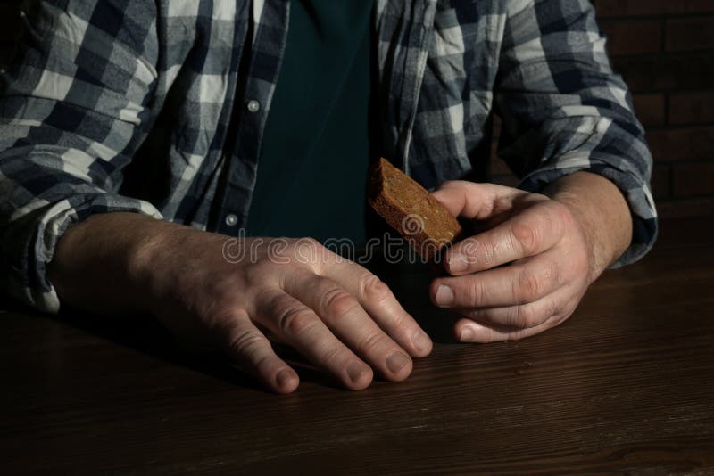Poor Senior Man with Bread at Table Stock Photo - Image of donation ...