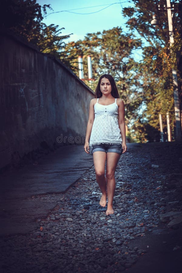 Poor woman on the street stock photo. Image of house - 43160756