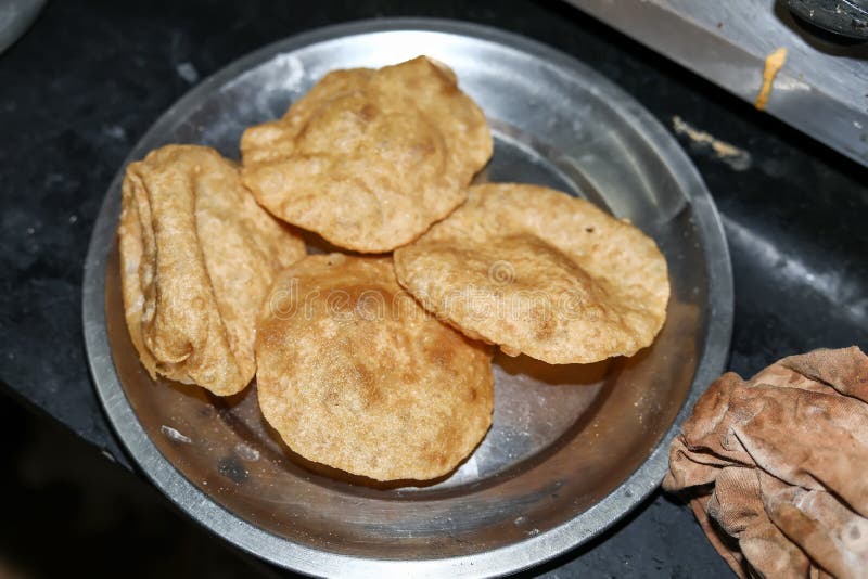 Poori Indian Bread Fried in a Pan on a Platter Stock Image - Image of ...