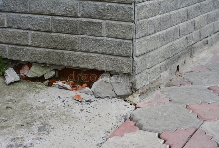 Poorly Constructed Foundation of the House. Ashlar Facade Bricks are ...