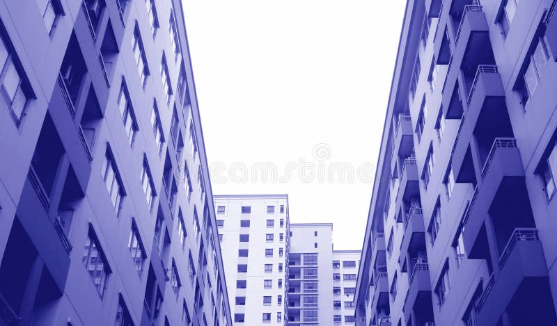 Low Angle View of Modern High Buildings in Gradient Blue Color Stock ...