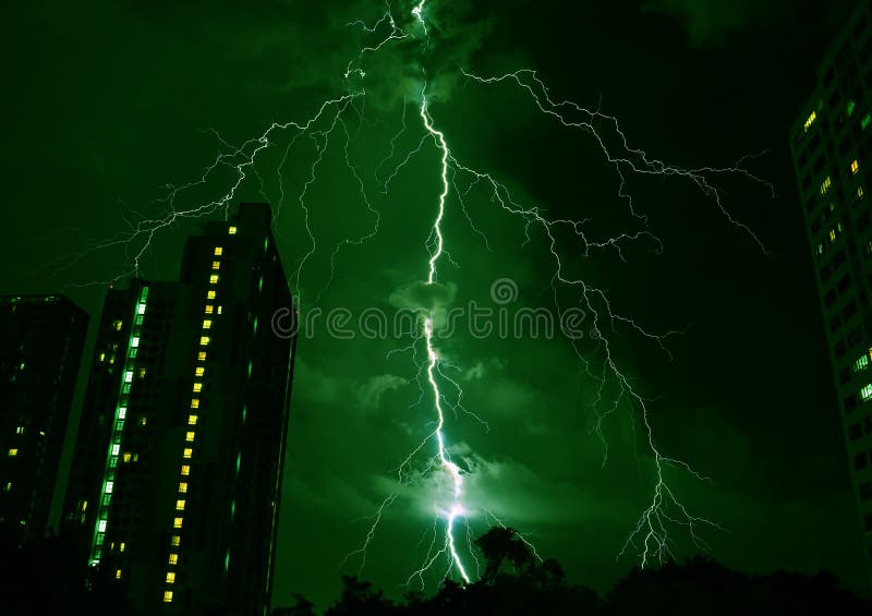 Green Colored Lightning Strikes in the Urban Night Sky Stock Image ...