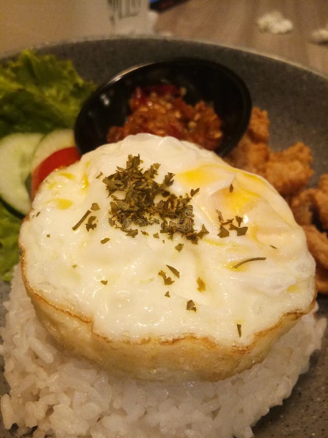 Pop Chicken Rice with Fried Egg and Chili Sauce Stock Photo - Image of ...