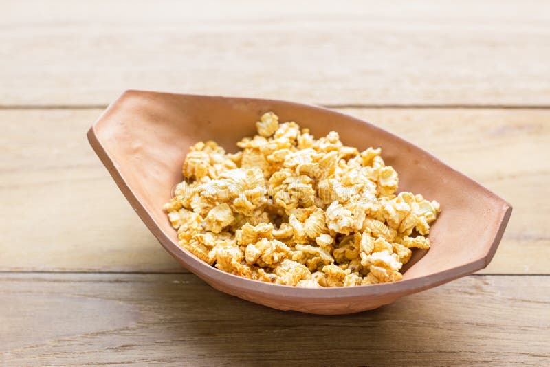 Pop Corn in Clay Baking Dish Stock Photo - Image of brown, popcorn ...