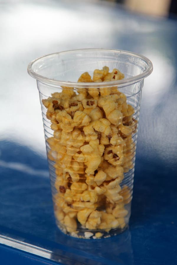 Pop corn in plastic glass stock photo. Image of tasty - 159693372
