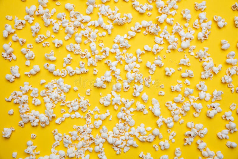 Pop Corn Scattered on Yellow Color Background, Full Frame, Top View ...